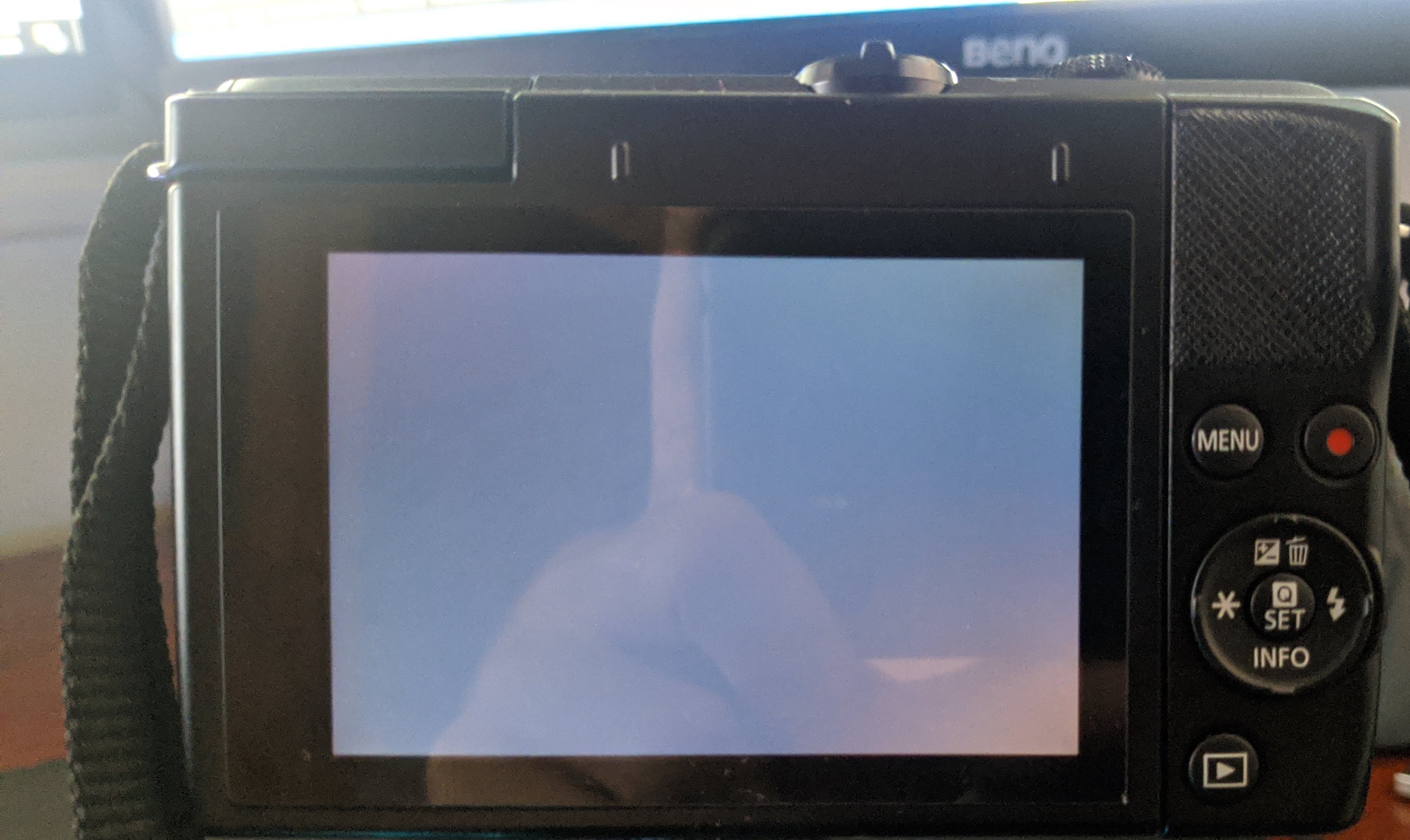 Solved: White and colored spot on LCD screen - EOS M200 - Canon Community
