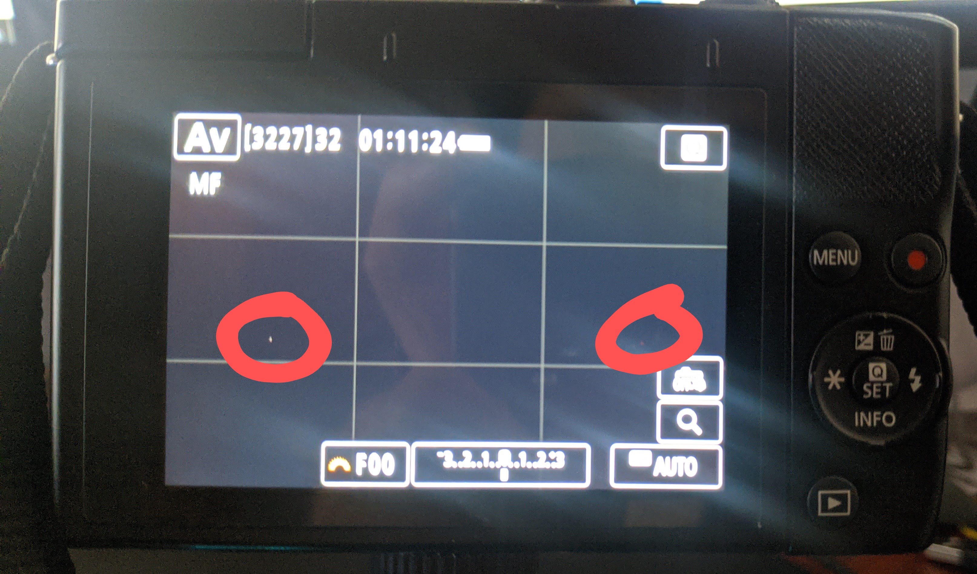 Solved: White and colored spot on LCD screen - EOS M200 - Canon Community