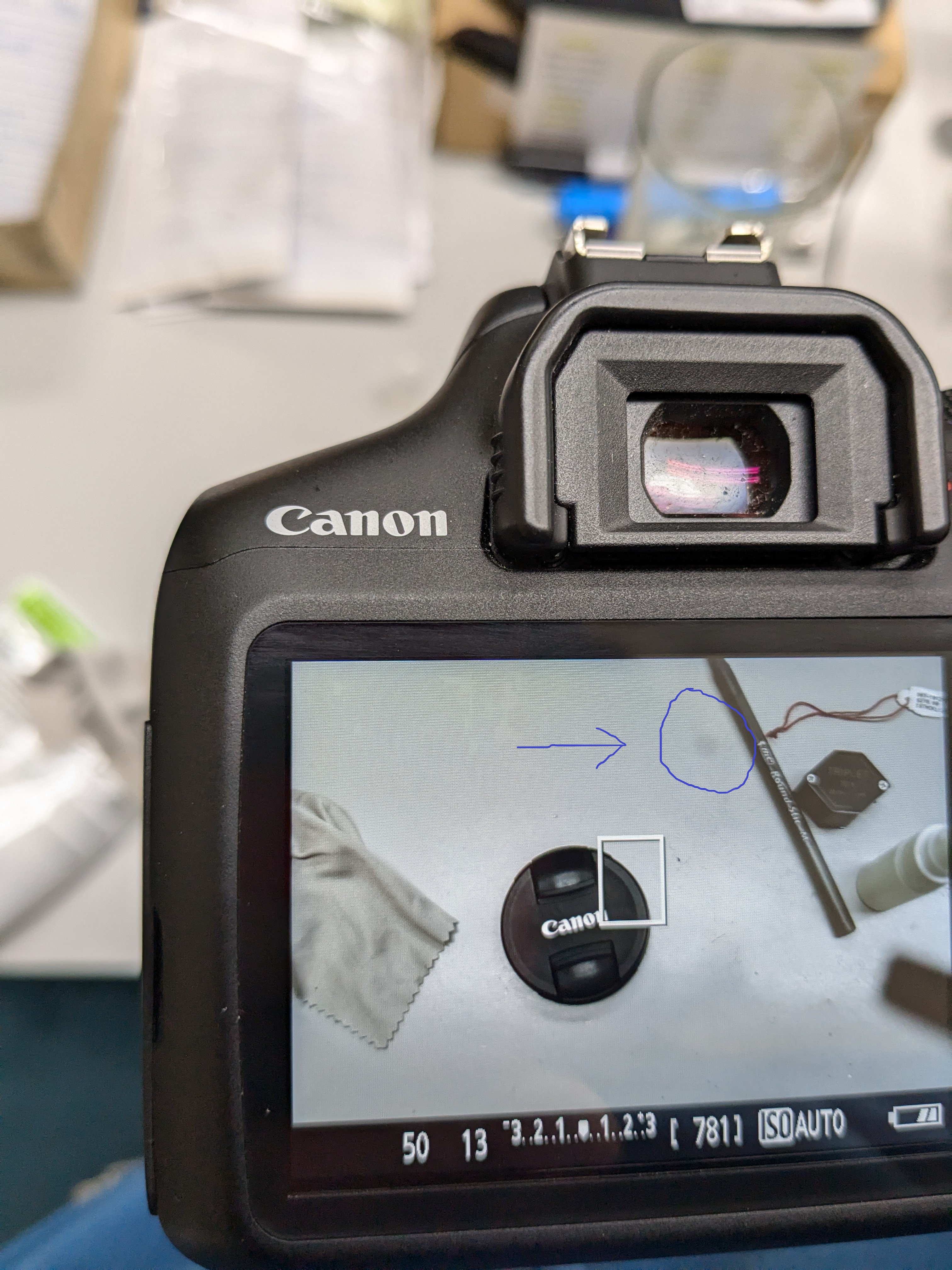 EOS 200D: Issue with Smudges and Black Dots on Ima... - Canon Community