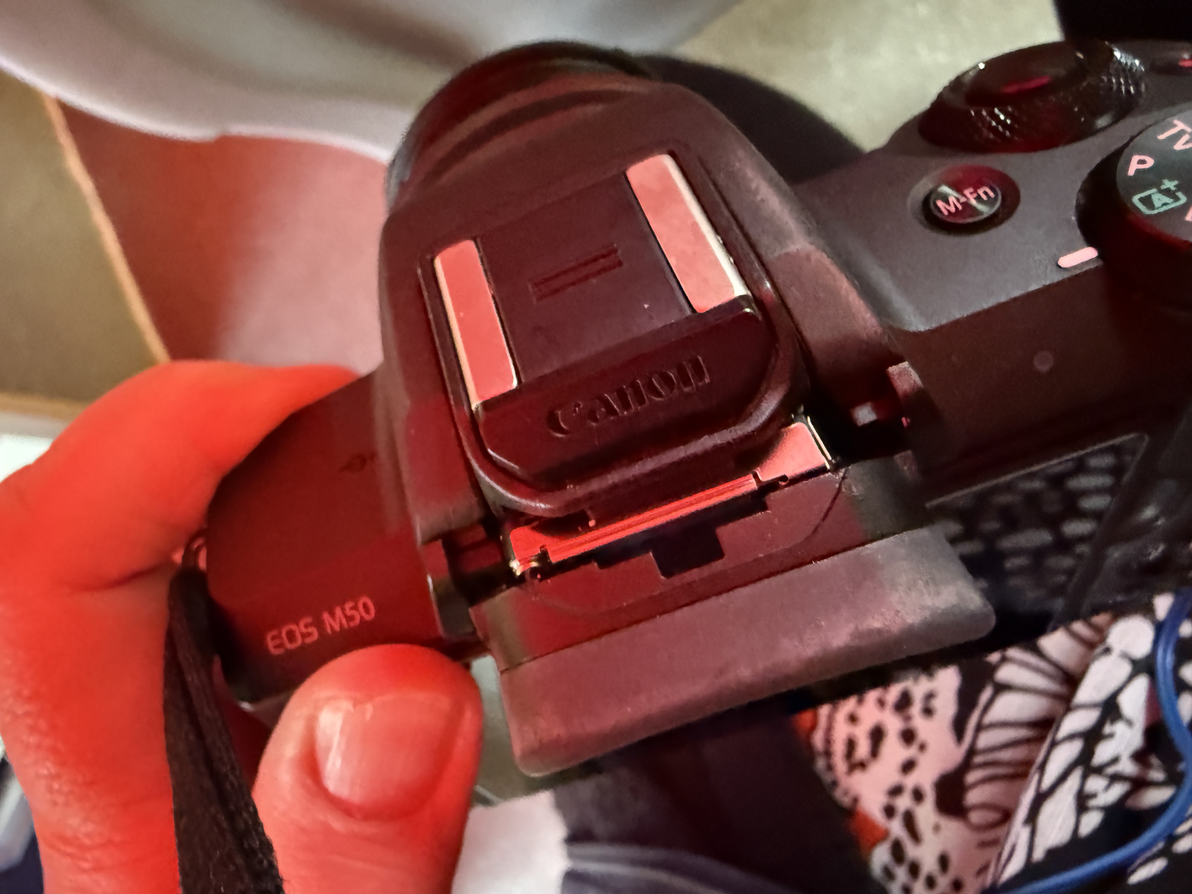 Eos M50 viewfinder has shifted/partially detached - Canon Community